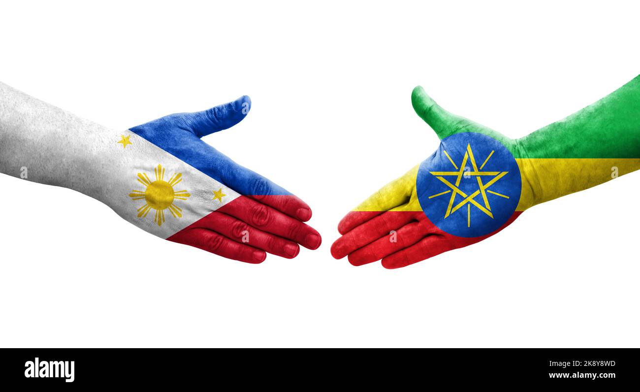 Handshake between Ethiopia and Philippines flags painted on hands ...