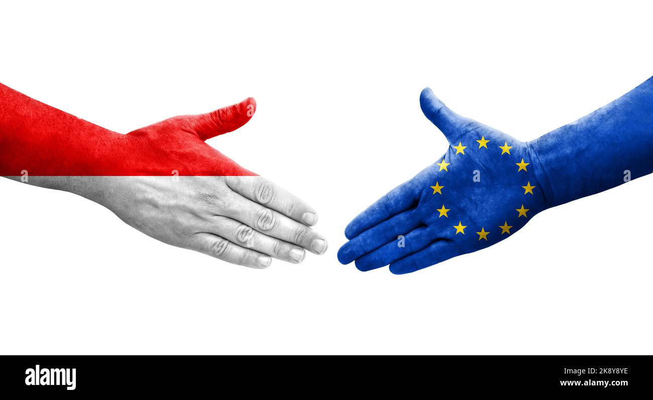 Handshake between European Union and Indonesia flags painted on hands ...