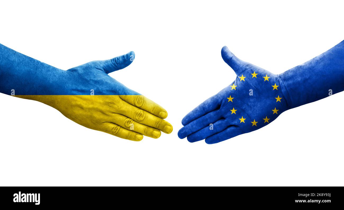 Handshake between European Union and Ukraine flags painted on hands ...