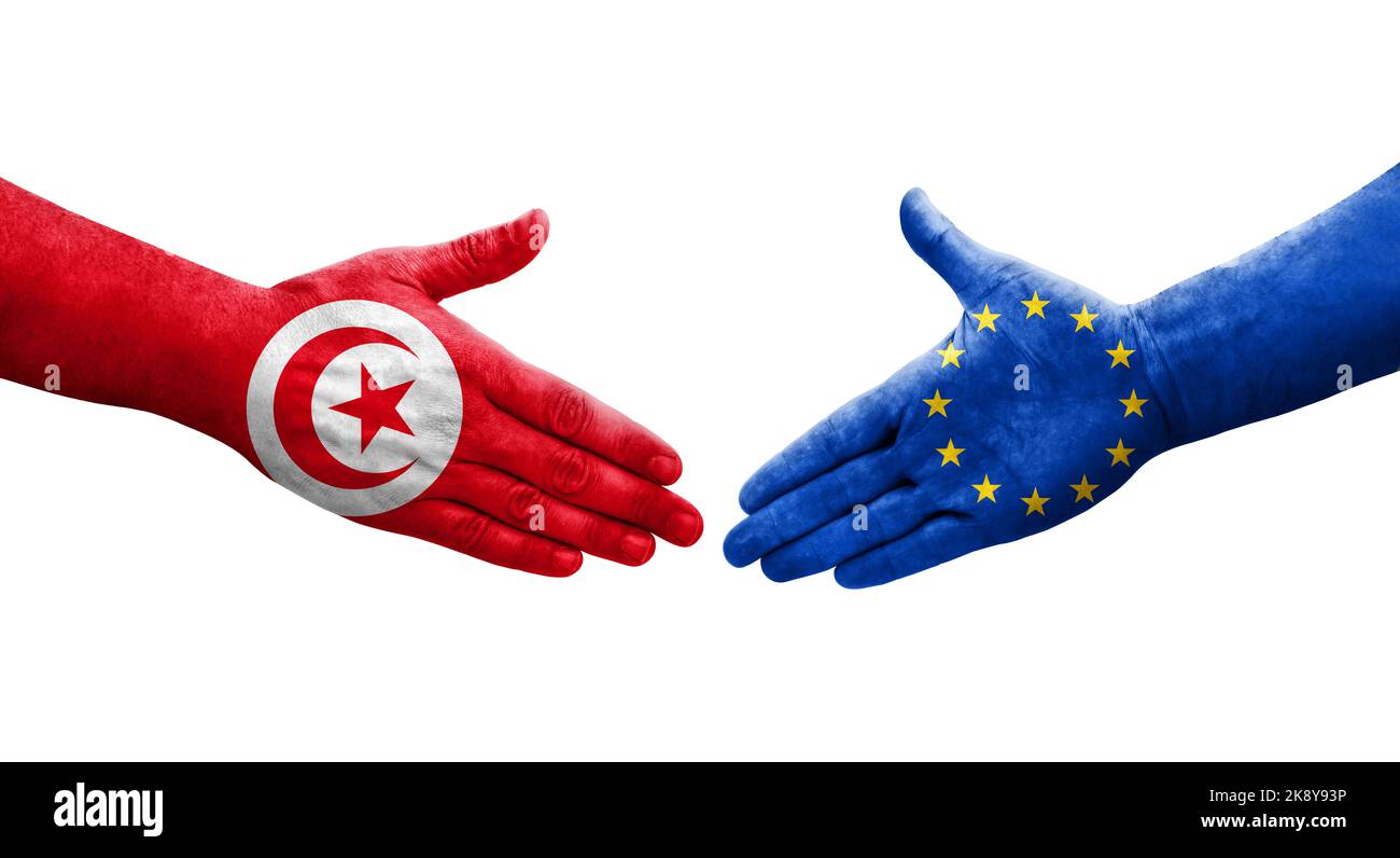 Handshake between European Union and Tunisia flags painted on hands ...