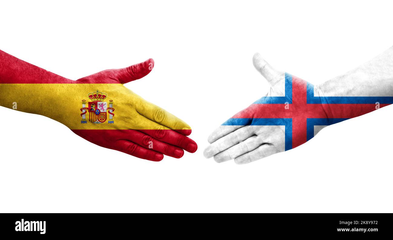 Handshake between Faroe Islands and Spain flags painted on hands ...