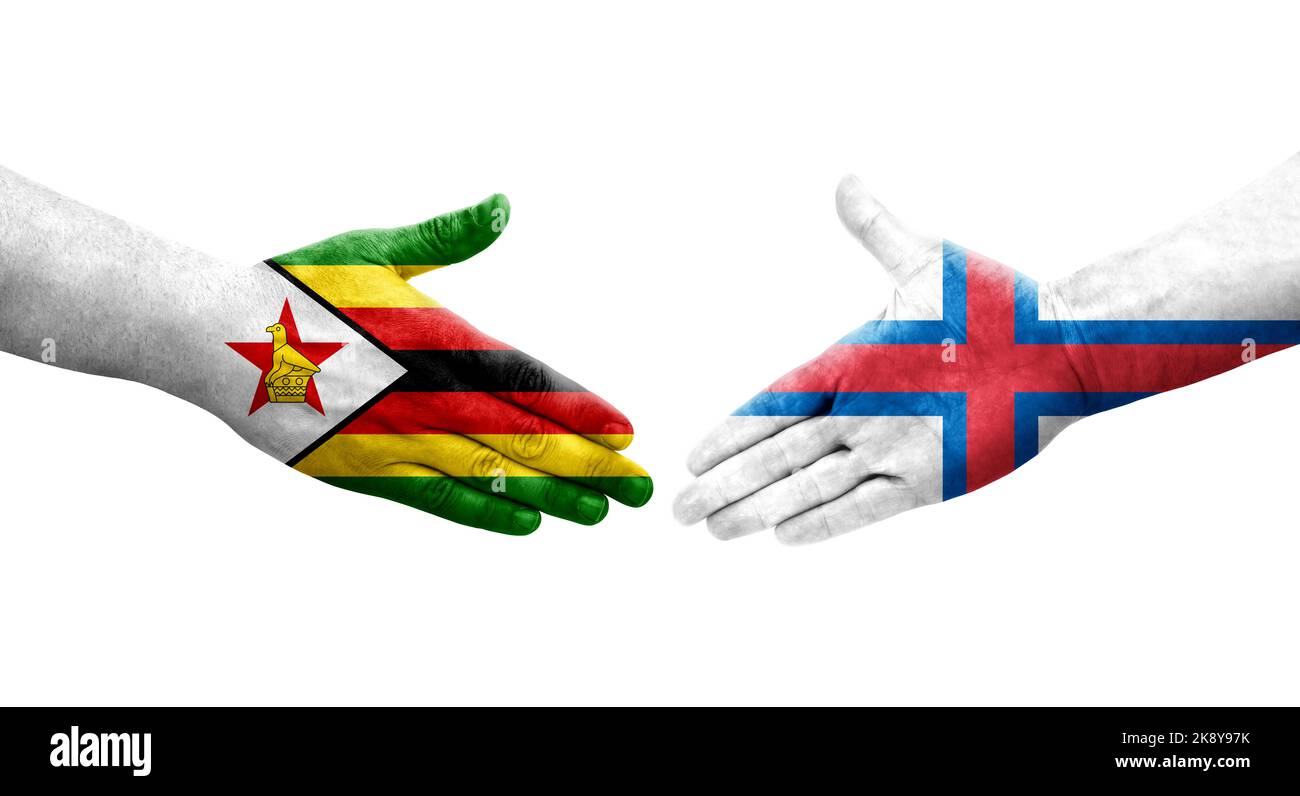 Handshake between Faroe Islands and Zimbabwe flags painted on hands ...