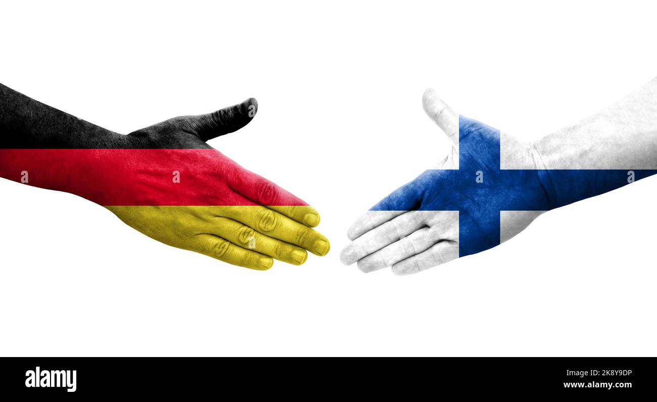 Handshake between Finland and Germany flags painted on hands, isolated ...