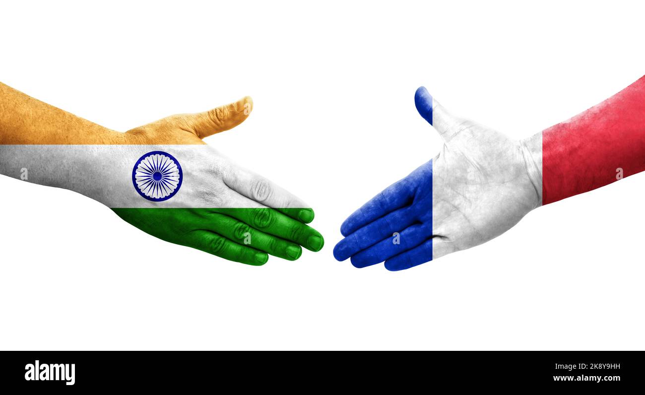 Handshake between France and India flags painted on hands, isolated ...