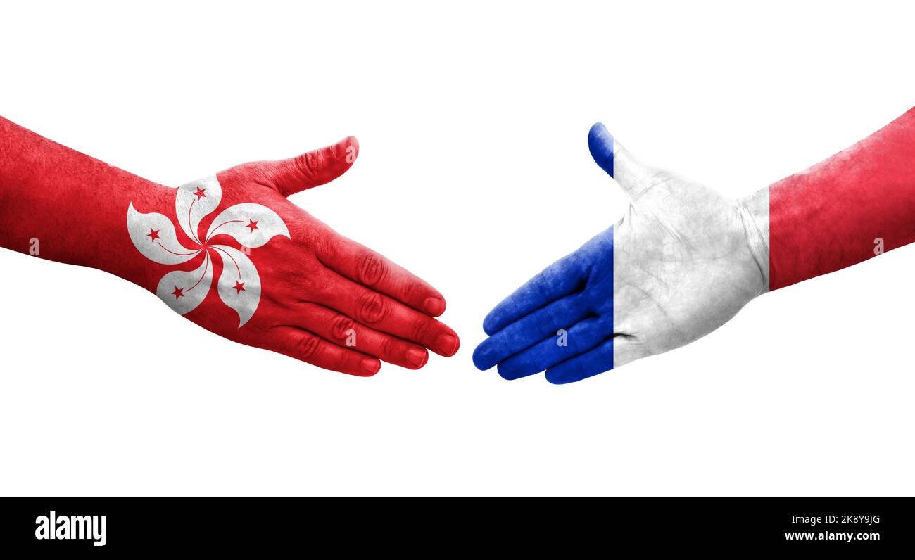 Handshake between France and Hong Kong flags painted on hands, isolated ...