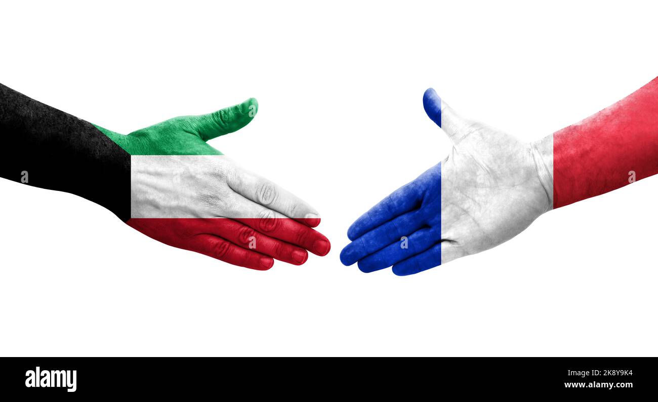 Handshake between France and Kuwait flags painted on hands, isolated ...