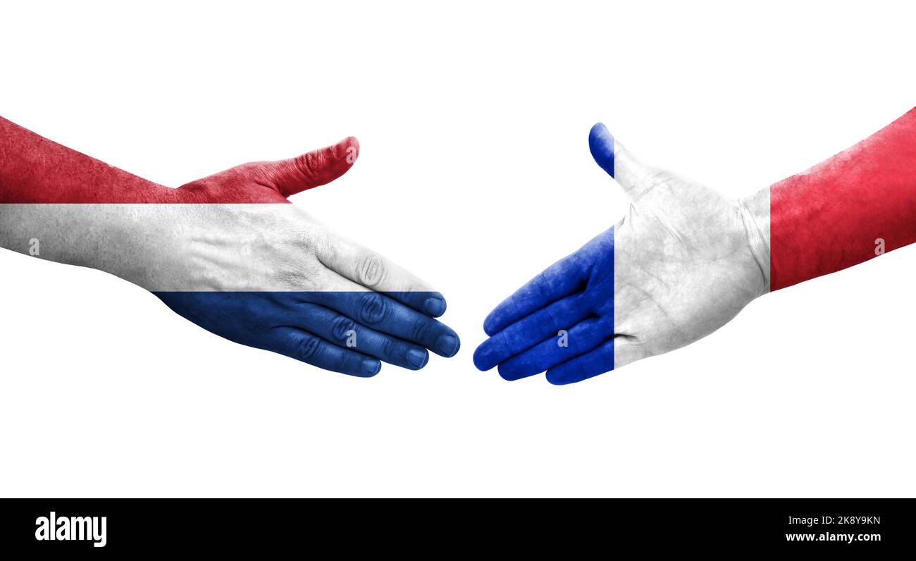 Handshake between France and Netherlands flags painted on hands ...
