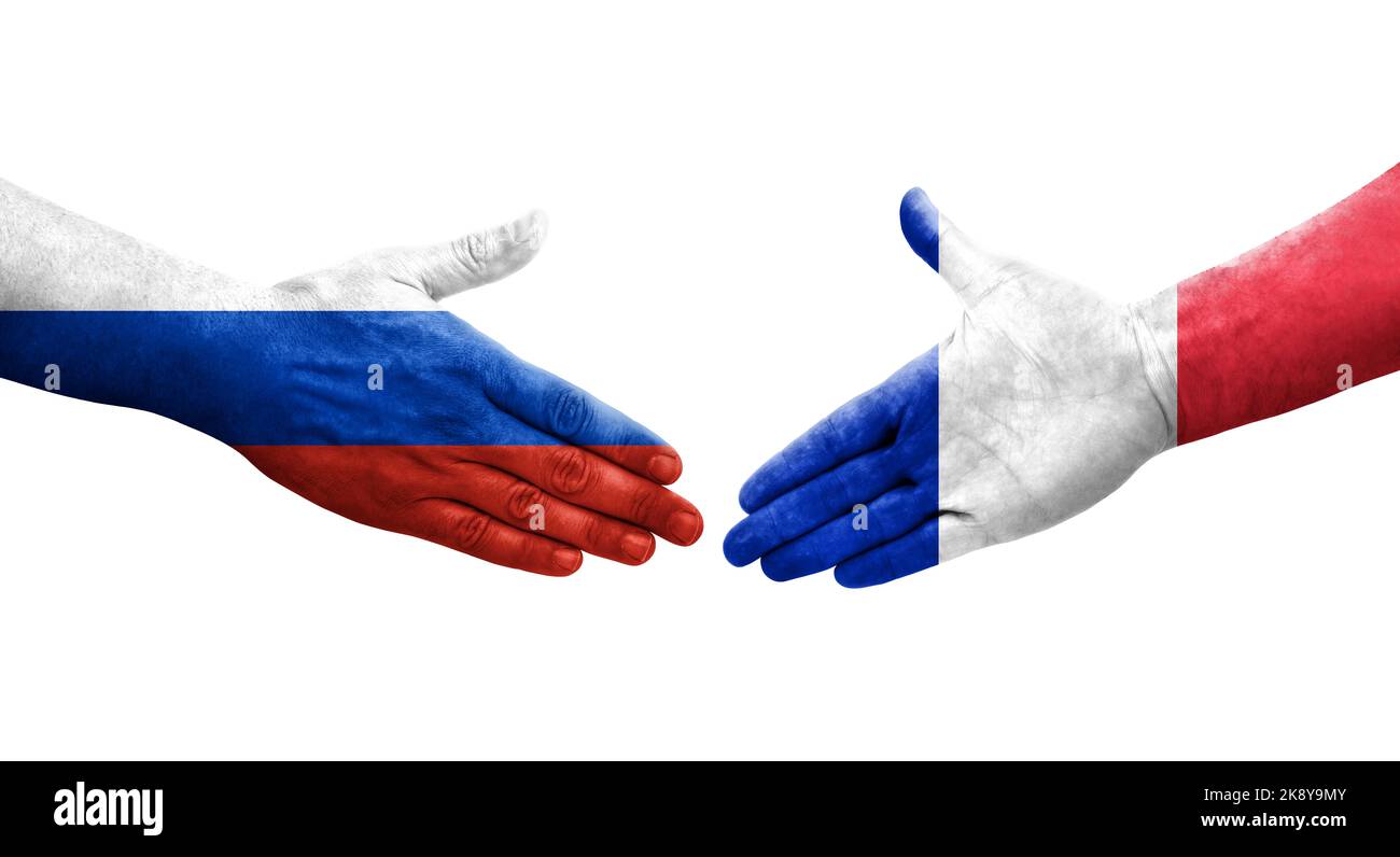 Handshake between France and Russia flags painted on hands, isolated ...