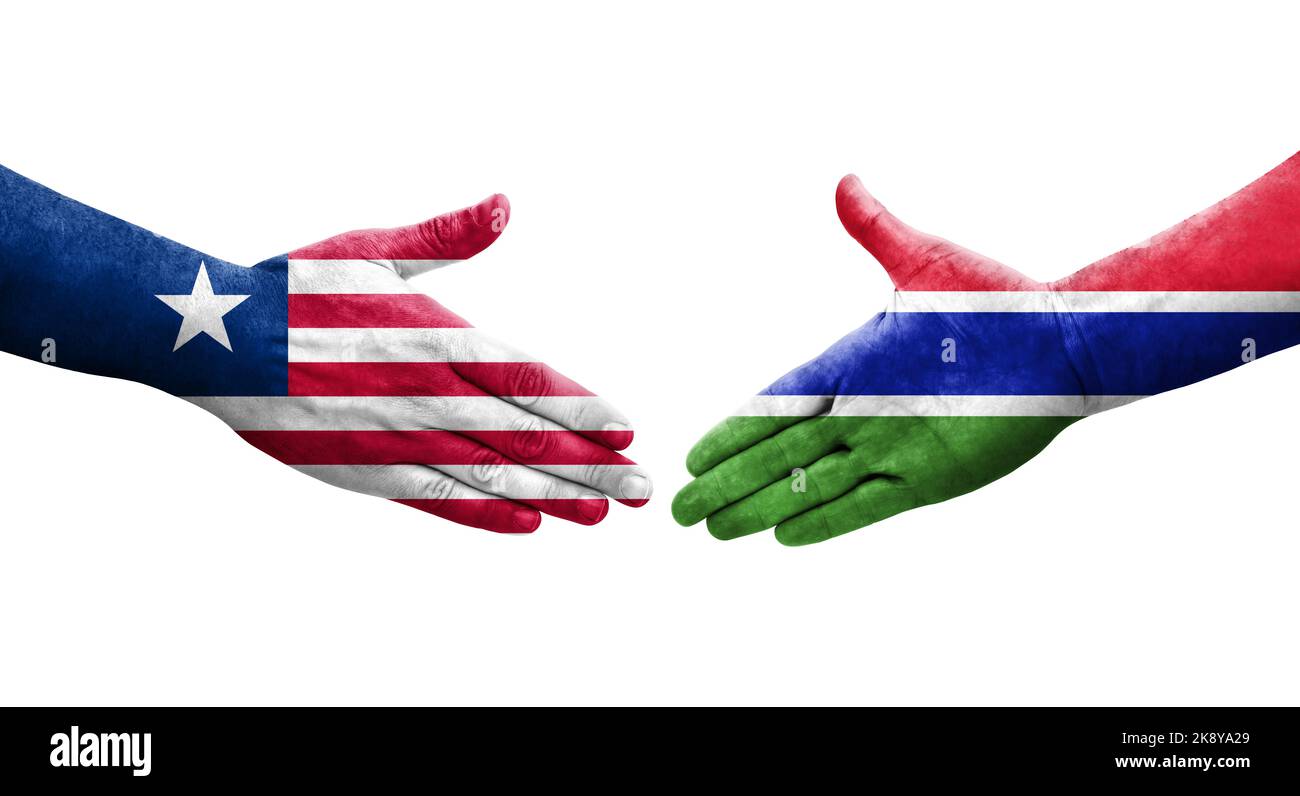 Handshake between Gambia and Liberia flags painted on hands, isolated ...