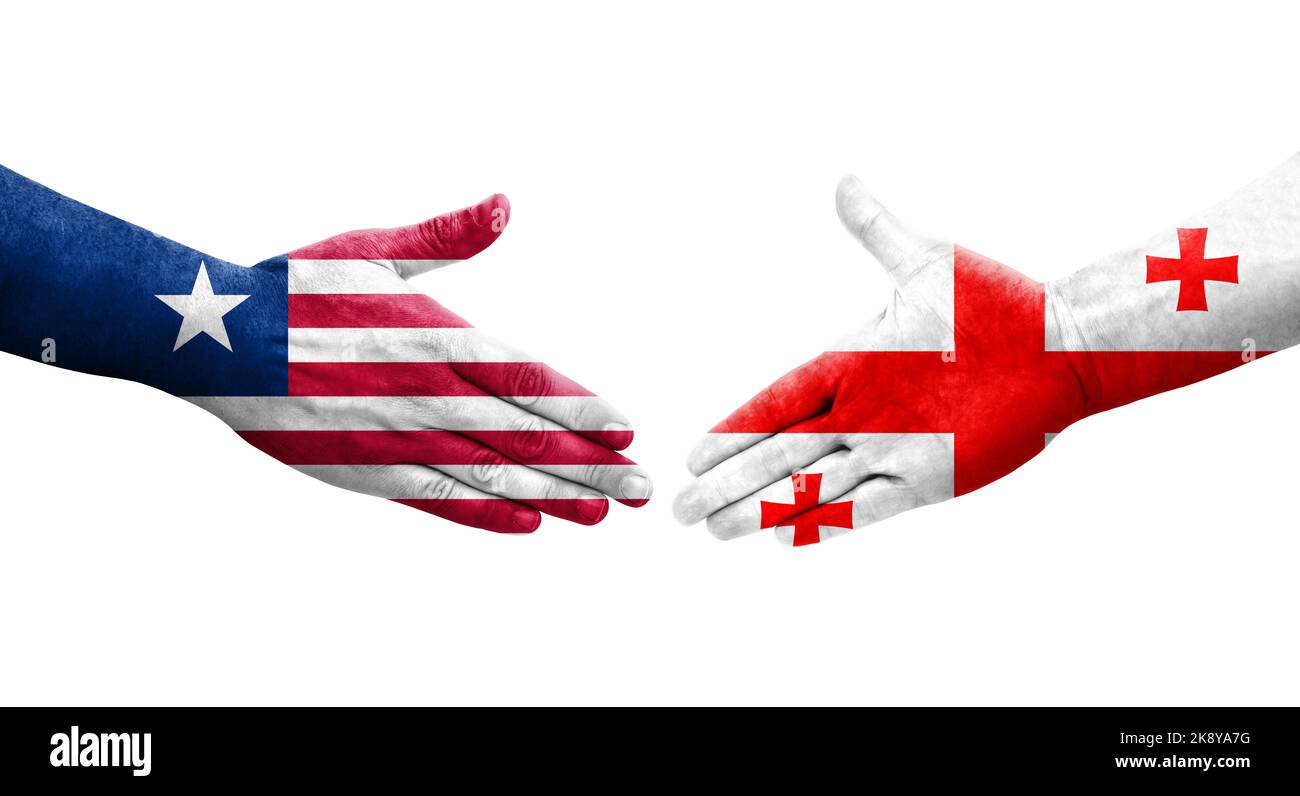Handshake between Georgia and Liberia flags painted on hands, isolated ...