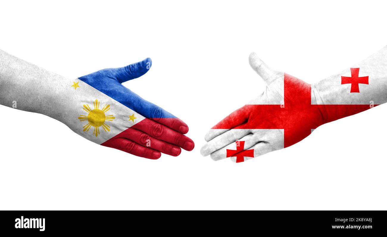 Handshake between Georgia and Philippines flags painted on hands ...