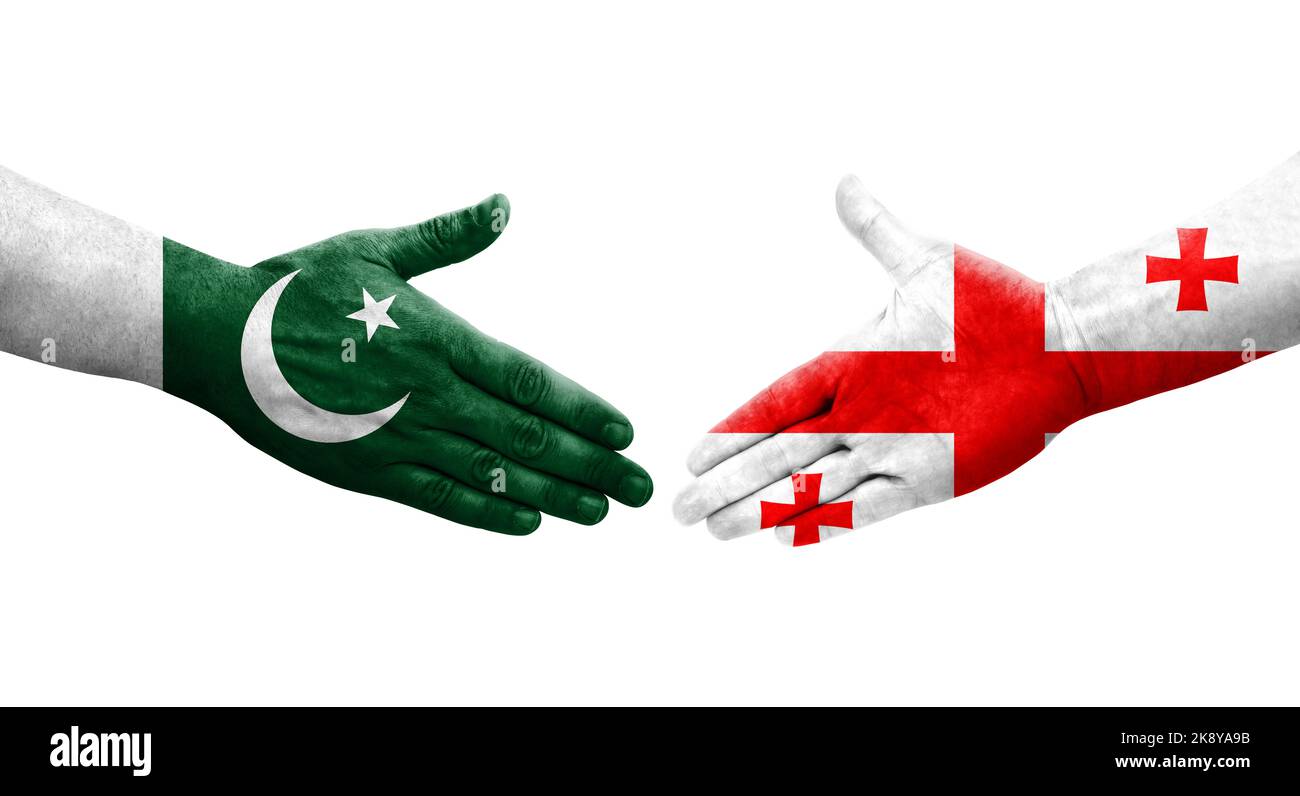 Handshake between Georgia and Pakistan flags painted on hands, isolated ...