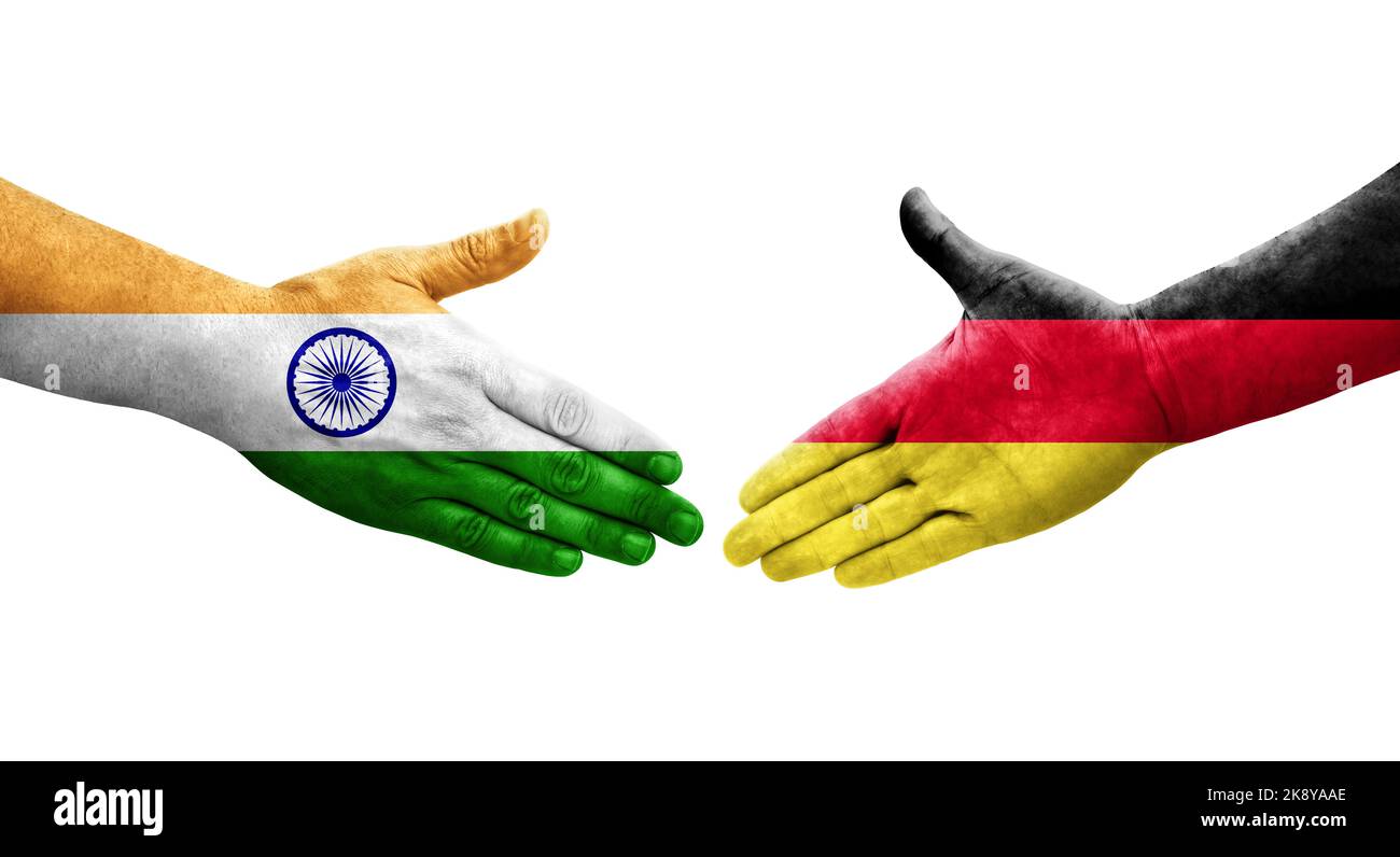 Handshake between Germany and India flags painted on hands, isolated ...