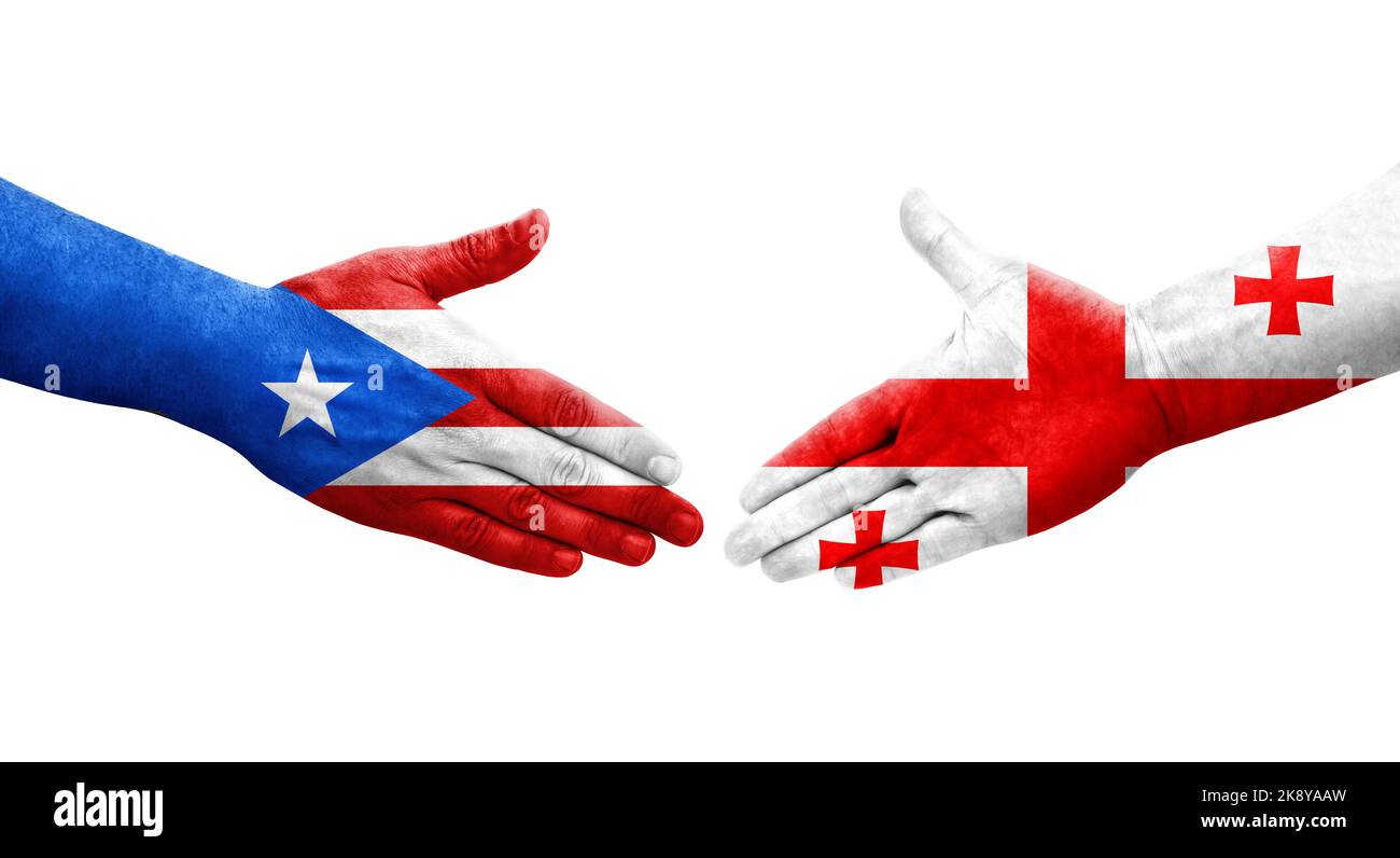 Handshake between Georgia and Puerto Rico flags painted on hands ...
