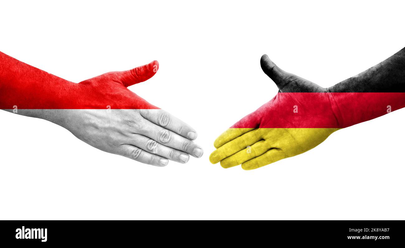 Handshake between Germany and Indonesia flags painted on hands ...