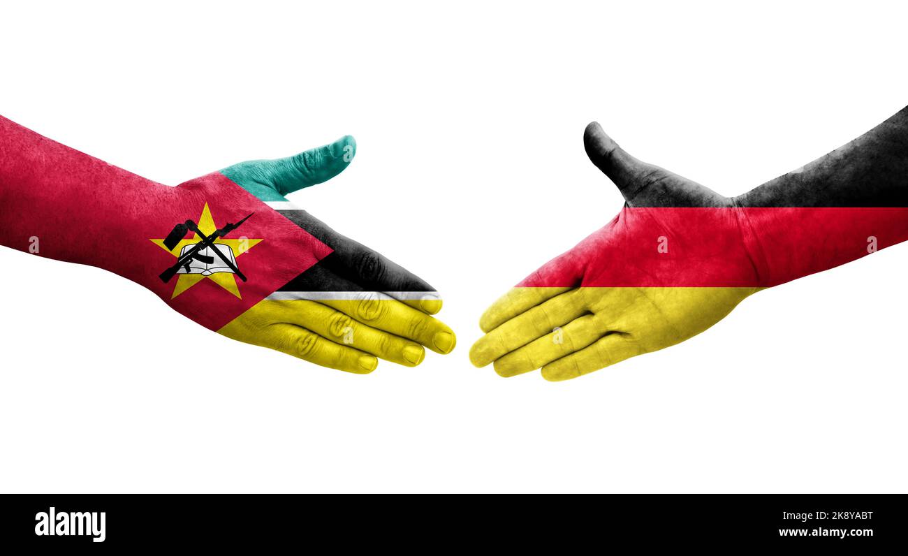Handshake between Germany and Mozambique flags painted on hands ...