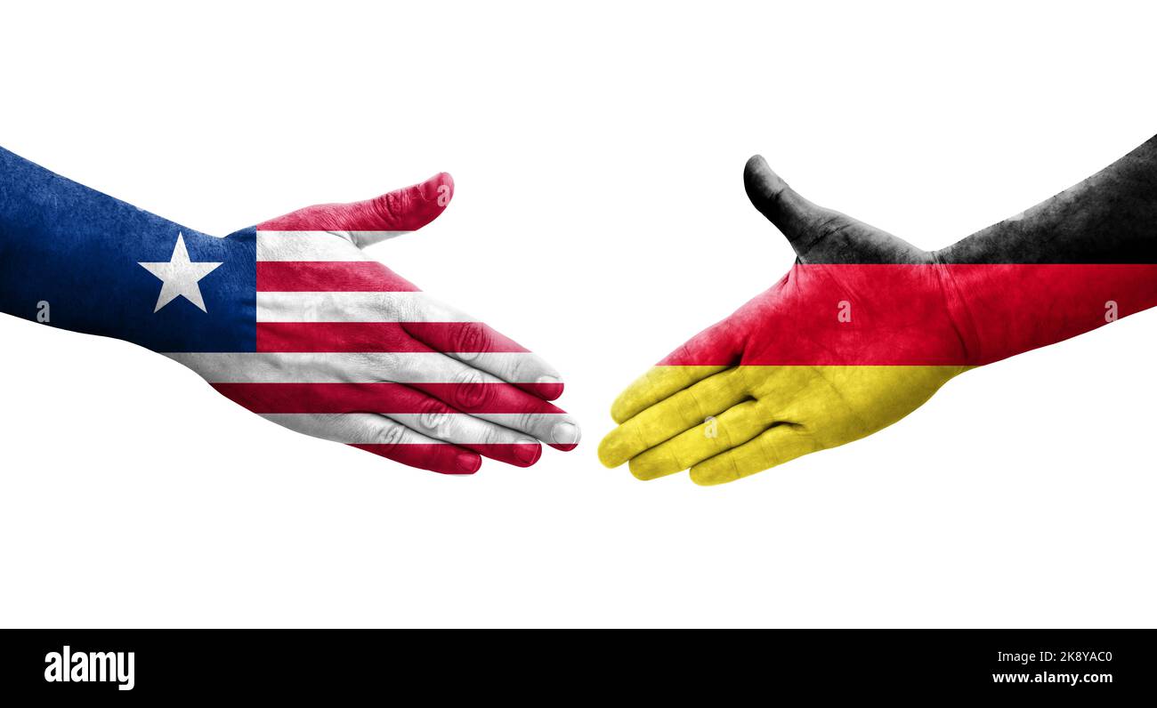 Handshake between Germany and Liberia flags painted on hands, isolated ...