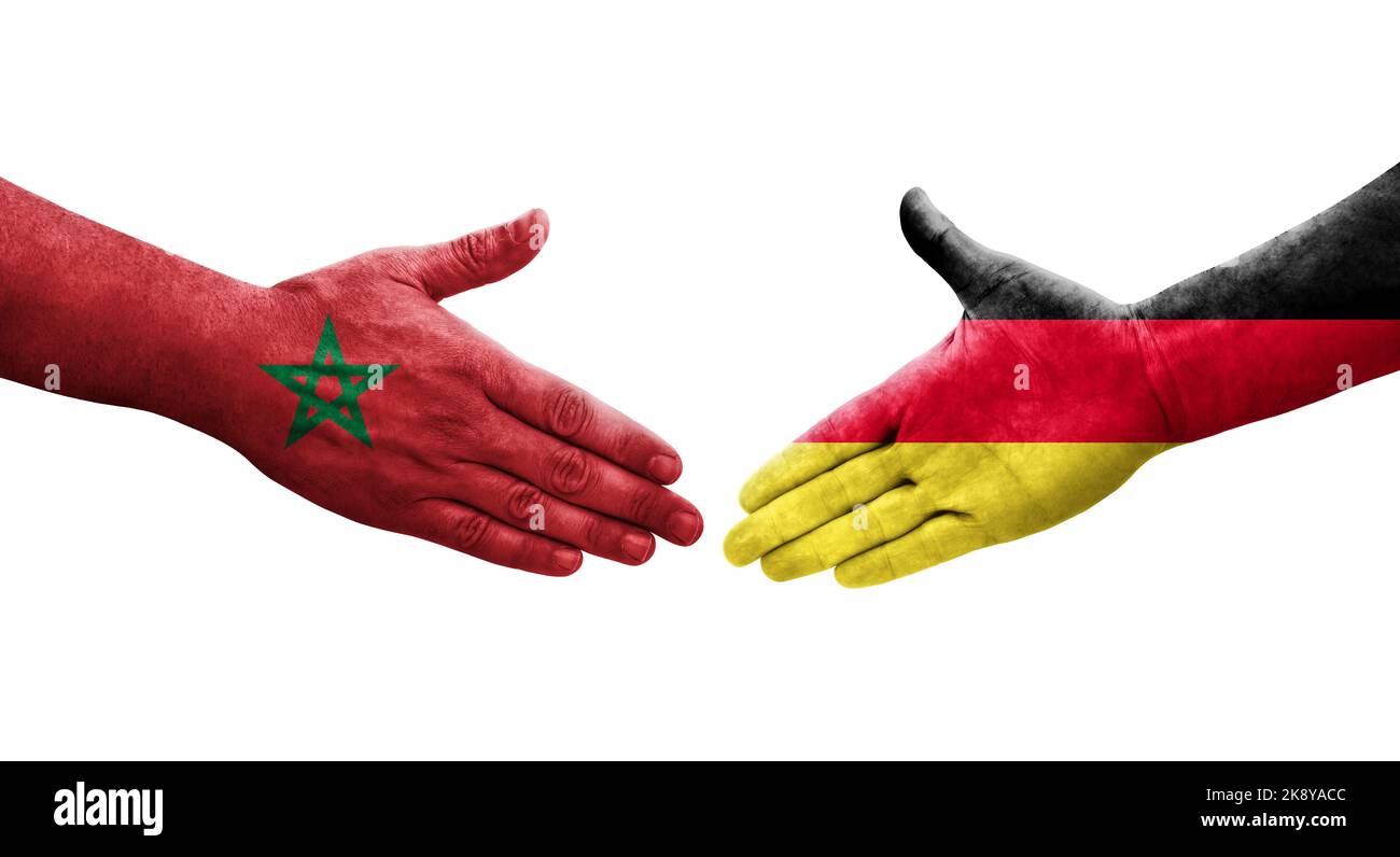 Handshake between Germany and Morocco flags painted on hands, isolated ...