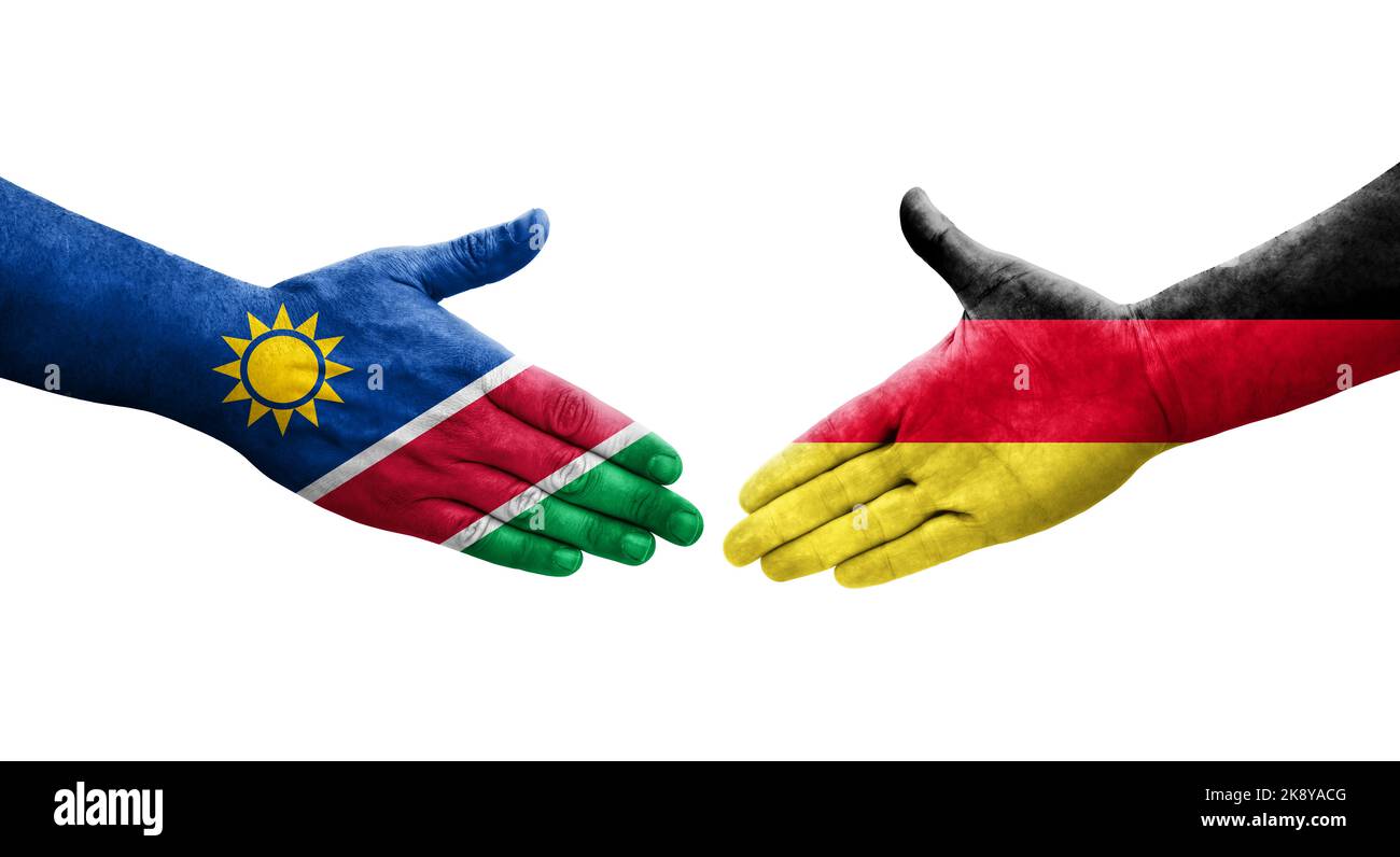 Handshake between Germany and Namibia flags painted on hands, isolated ...