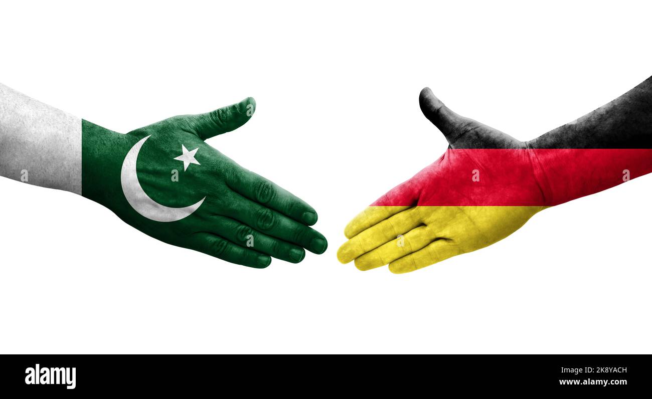 Handshake between Germany and Pakistan flags painted on hands, isolated ...