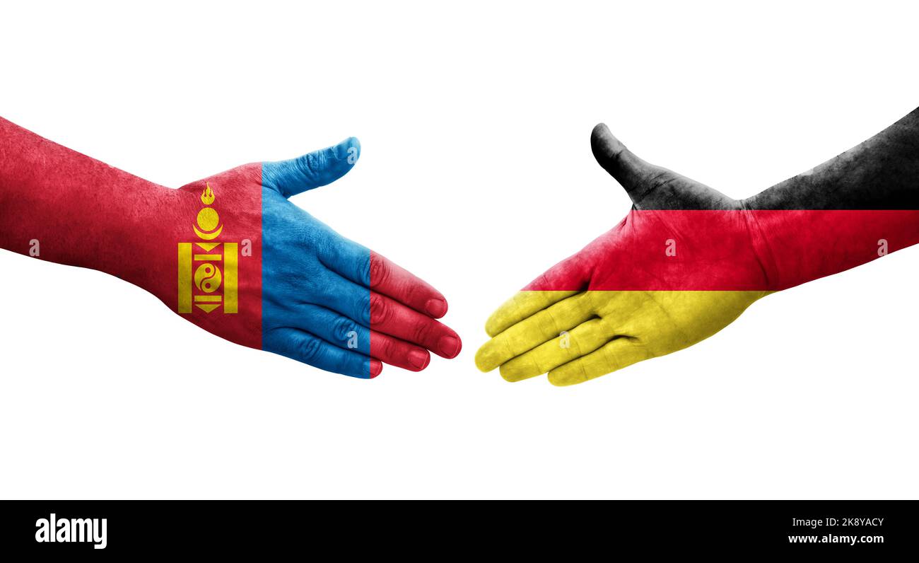 Handshake between Germany and Mongolia flags painted on hands, isolated ...