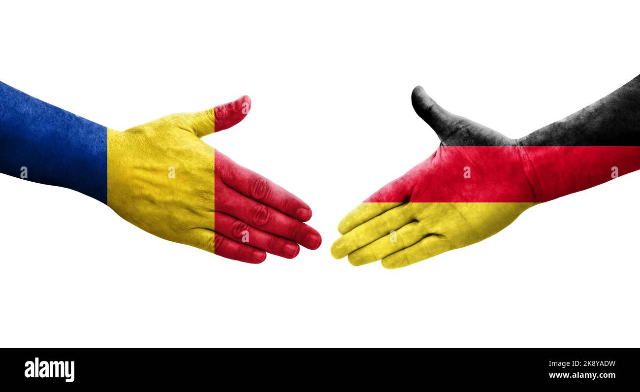 Handshake between Germany and Romania flags painted on hands, isolated ...