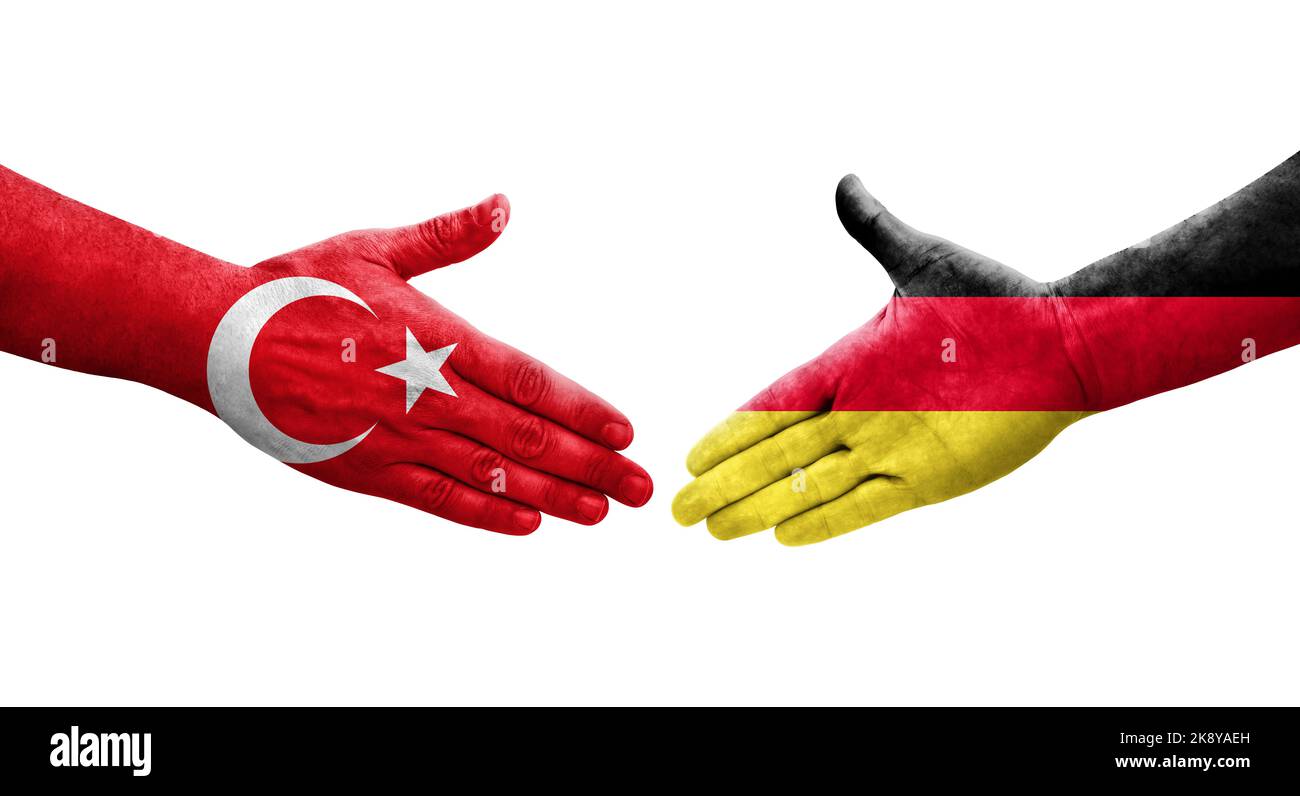 Handshake between Germany and Turkey flags painted on hands, isolated ...