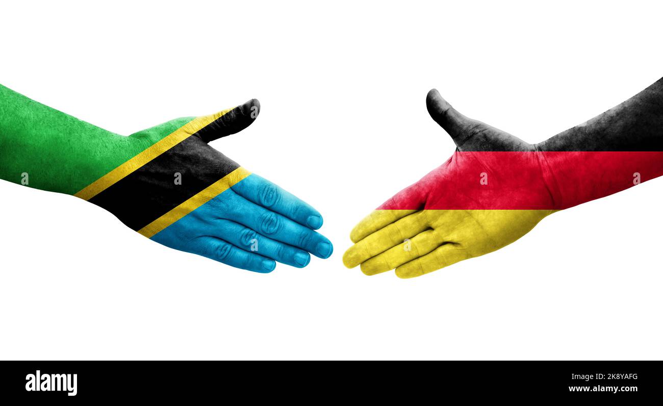 Handshake between Germany and Tanzania flags painted on hands, isolated ...
