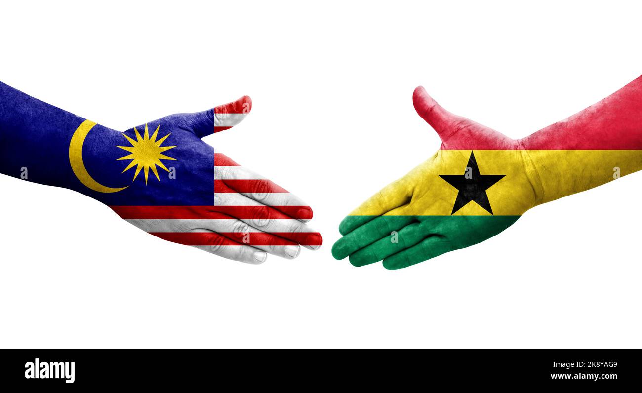 Handshake between Ghana and Malaysia flags painted on hands, isolated ...