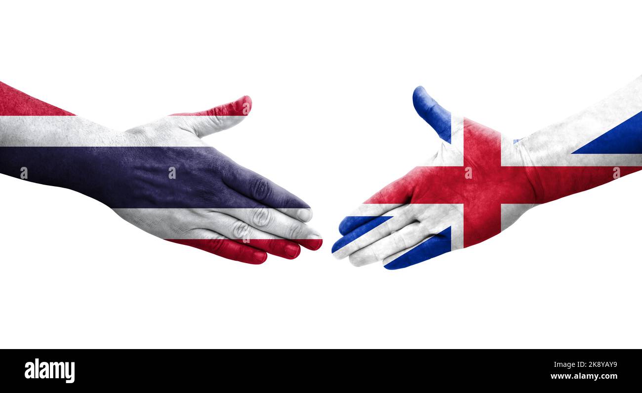 Handshake between Great Britain and Thailand flags painted on hands ...