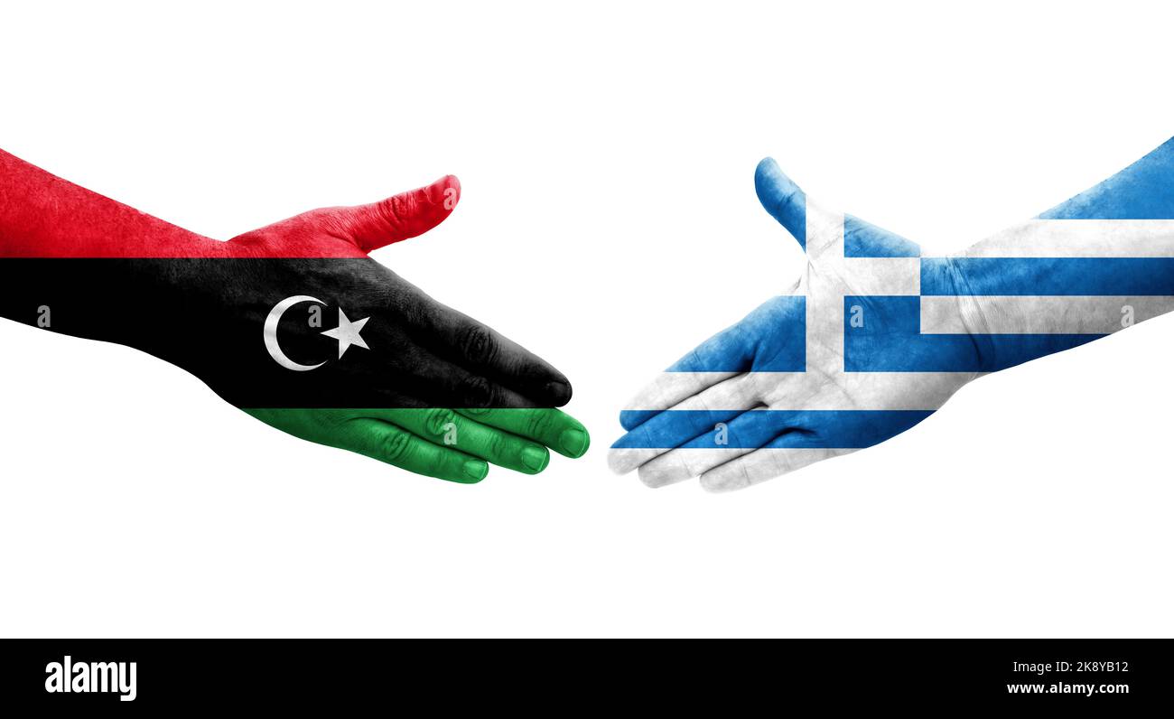 Handshake between Greece and Libya flags painted on hands, isolated ...