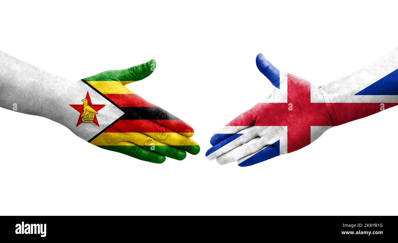 Handshake between Great Britain and Zimbabwe flags painted on hands ...