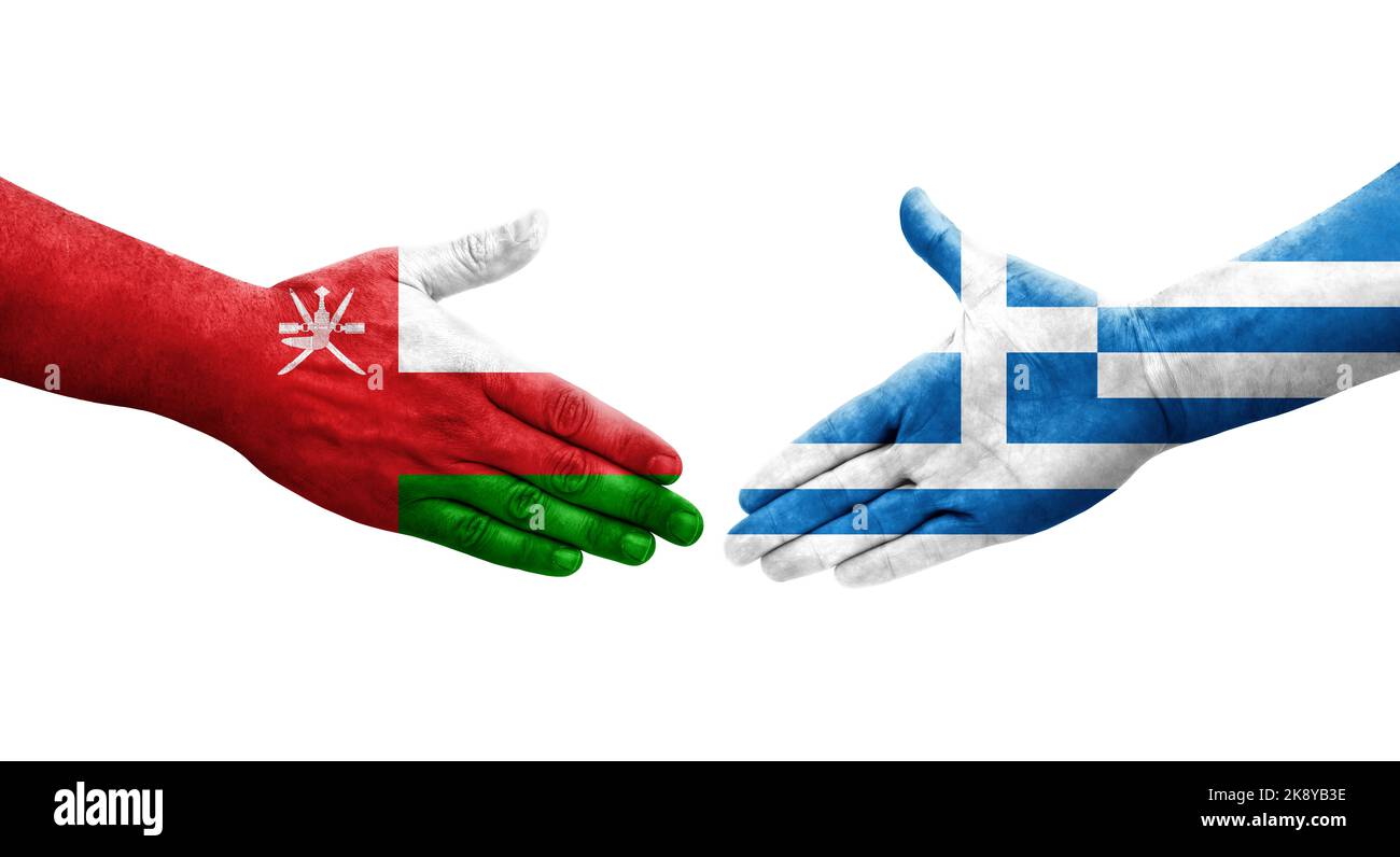 Handshake between Greece and Oman flags painted on hands, isolated ...