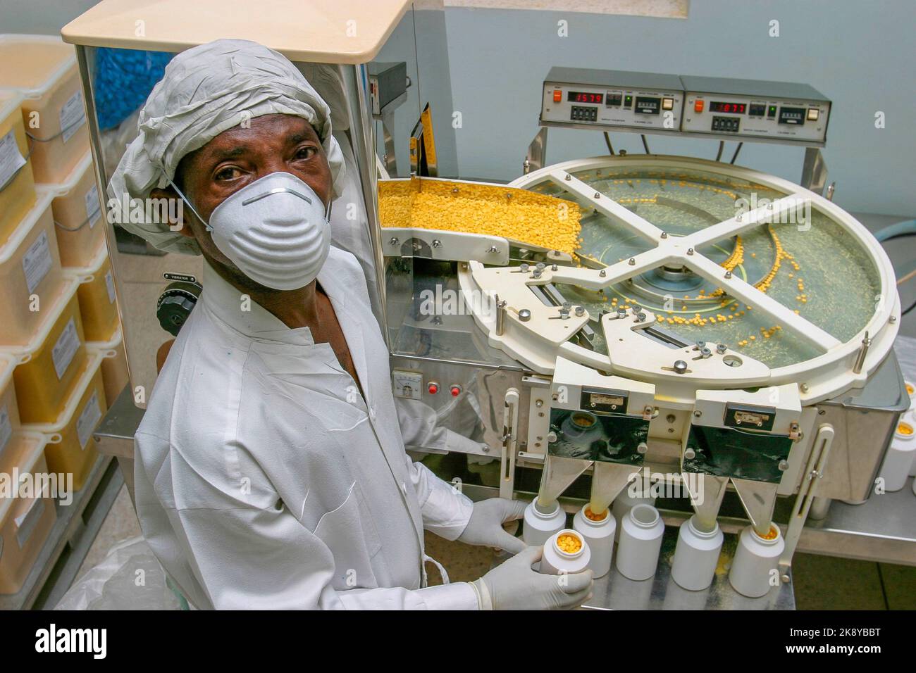 Ghana, Accra. Production line of pills and employee from Phyto Riker ...