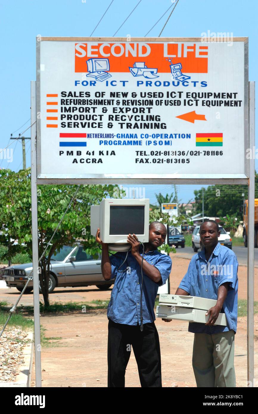 Ghana, Accra. Mechanics of computer recycling company with overhauled ...