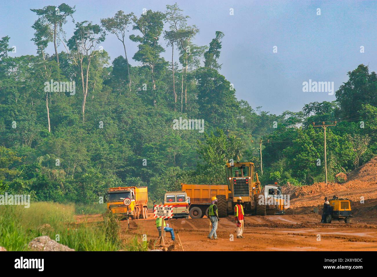 Ghana, Tarkwa. A road is being made, to be used by a mining company ...