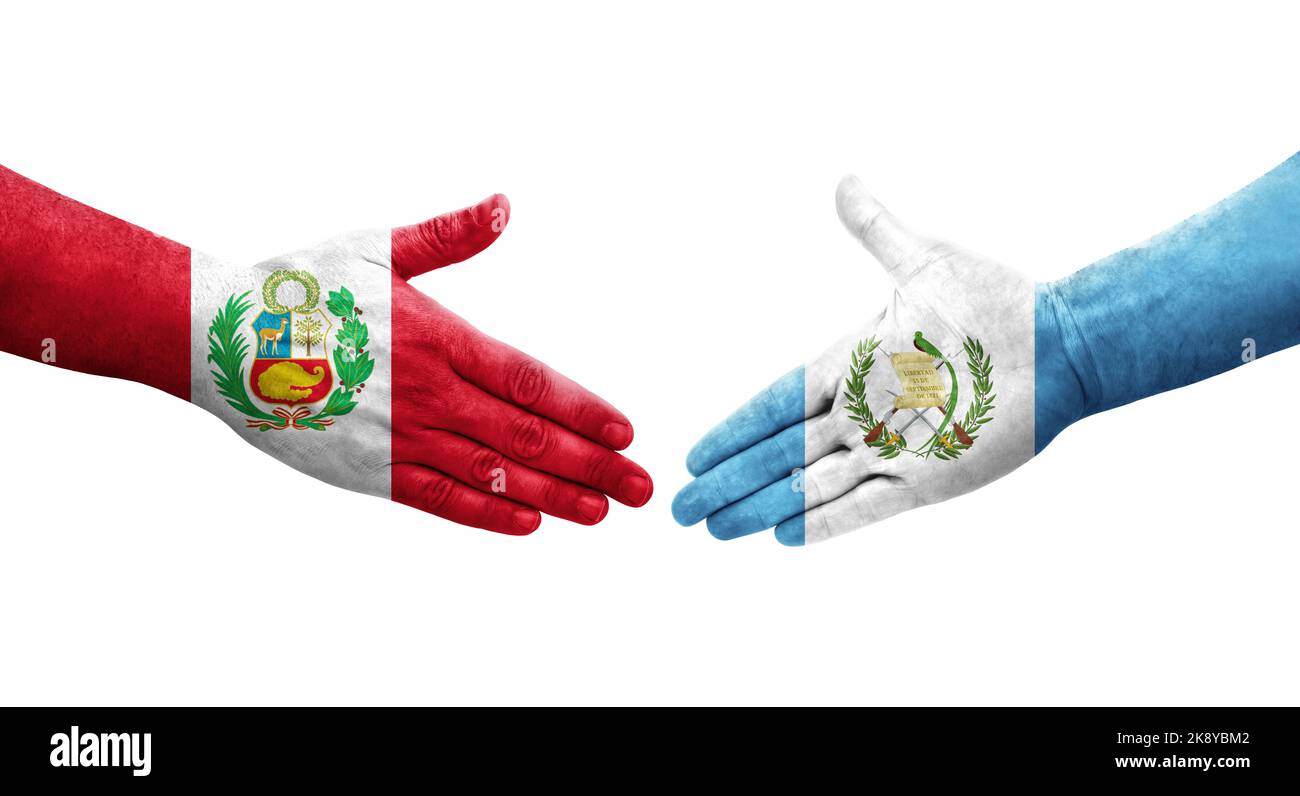 Handshake between Guatemala and Peru flags painted on hands, isolated ...