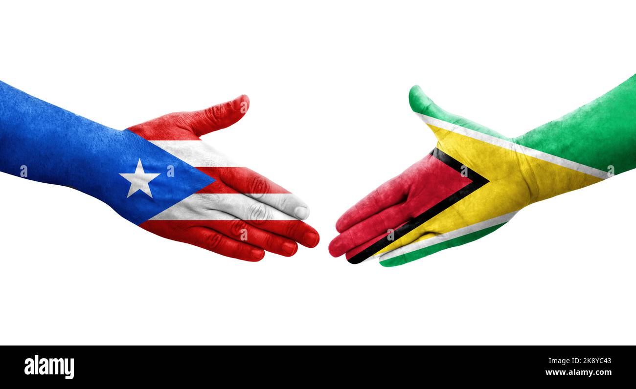 Handshake between Guyana and Puerto Rico flags painted on hands ...
