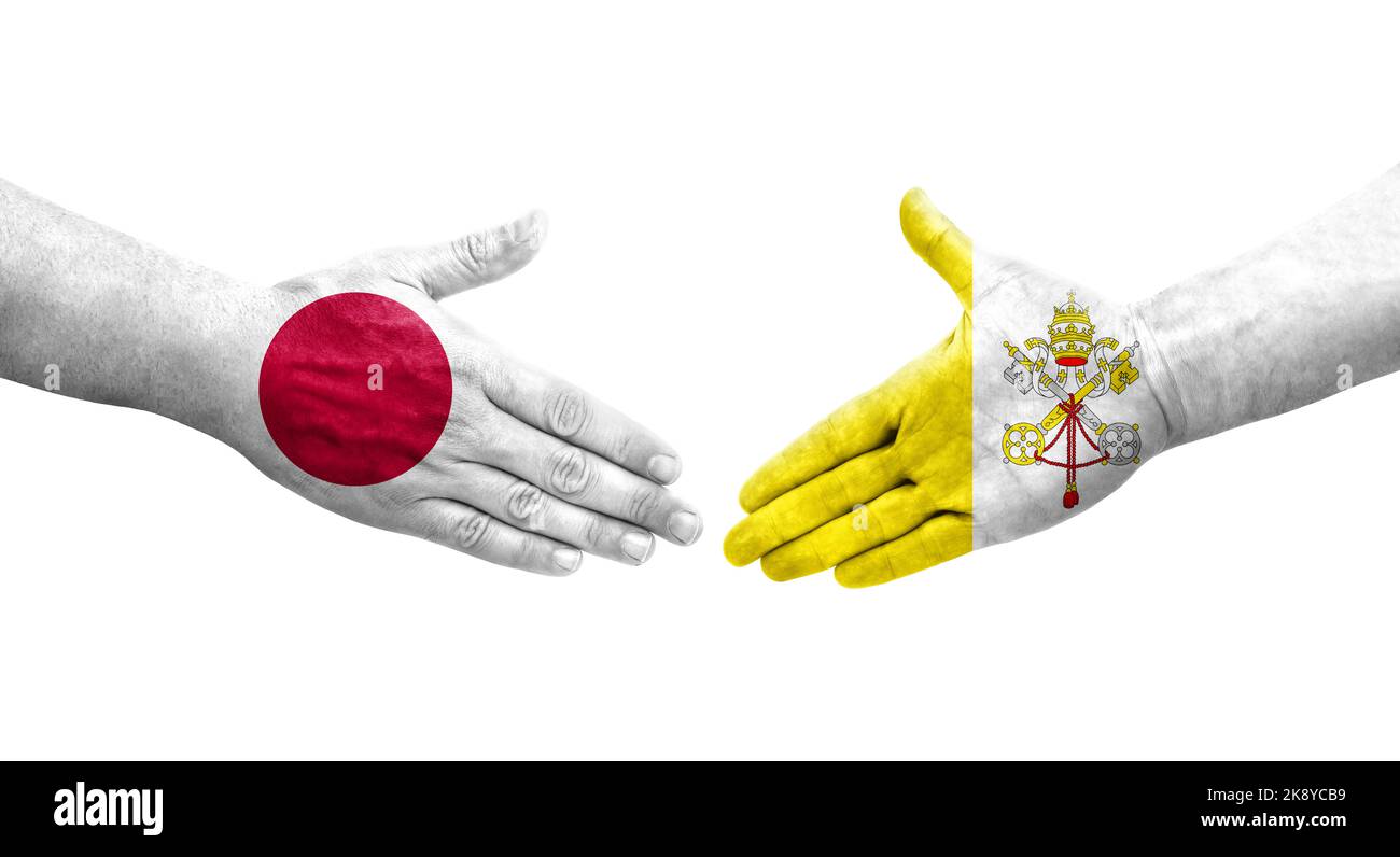 Handshake between Holy See and Japan flags painted on hands, isolated ...