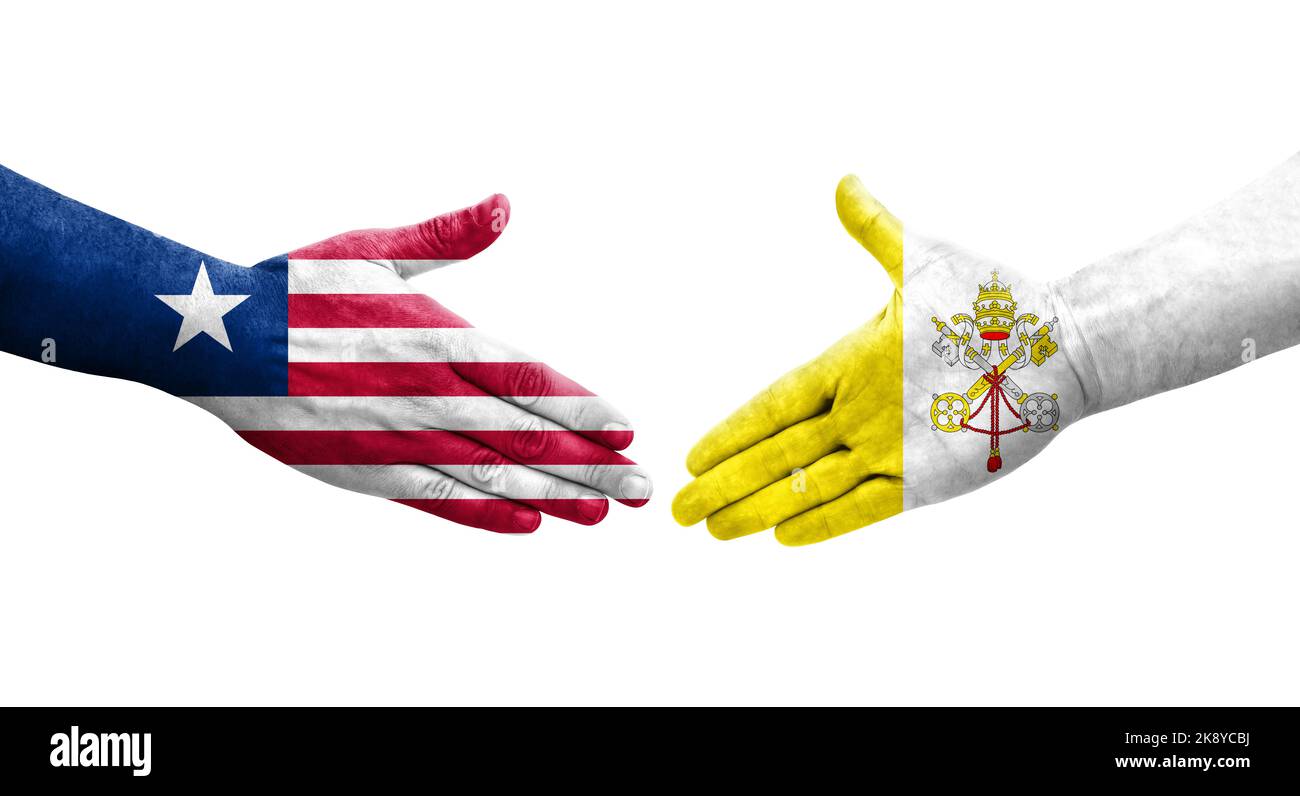 Handshake between Holy See and Liberia flags painted on hands, isolated ...