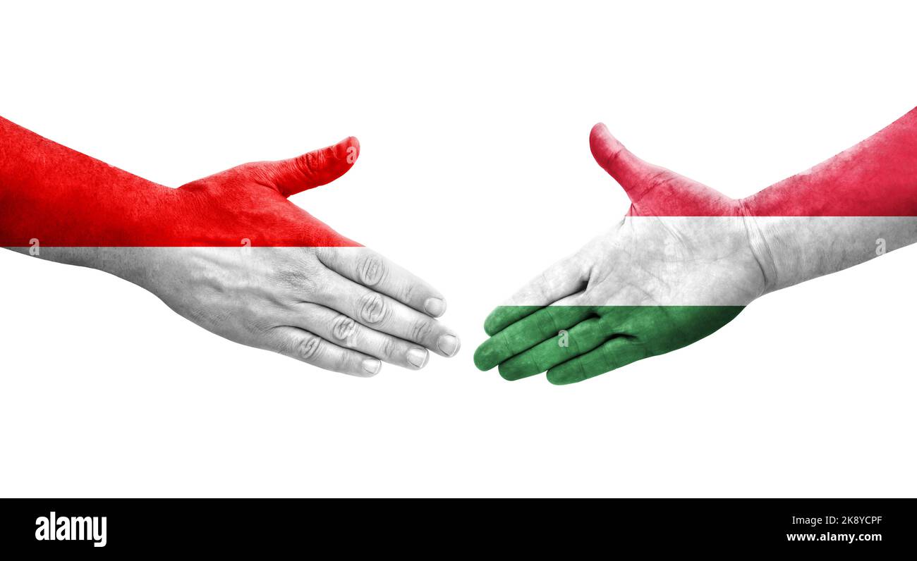 Handshake between Hungary and Indonesia flags painted on hands ...