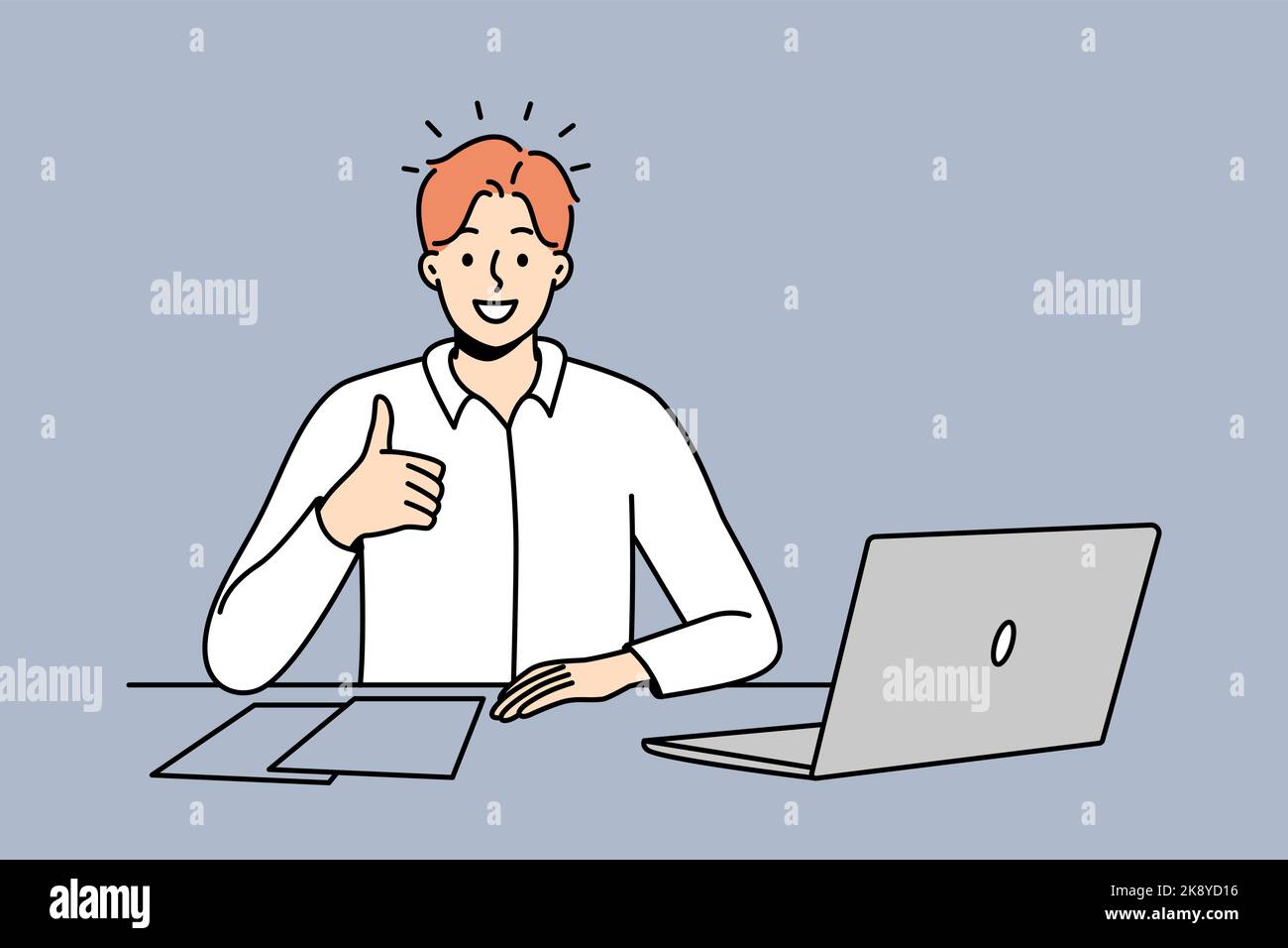 Smiling young businessman sit at office desk work on computer show ...