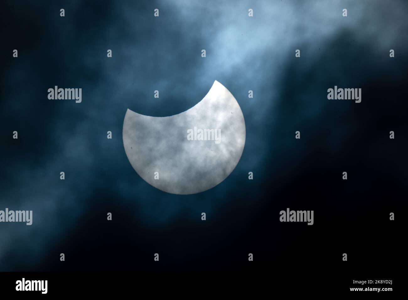 Schwerin, Germany. 25th Oct, 2022. A partial solar eclipse can be seen ...