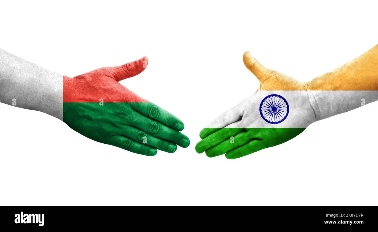 Handshake between India and Madagascar flags painted on hands, isolated ...