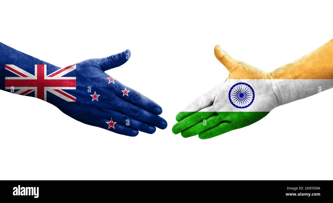 Handshake between India and New Zealand flags painted on hands, isolated transparent image Stock ...