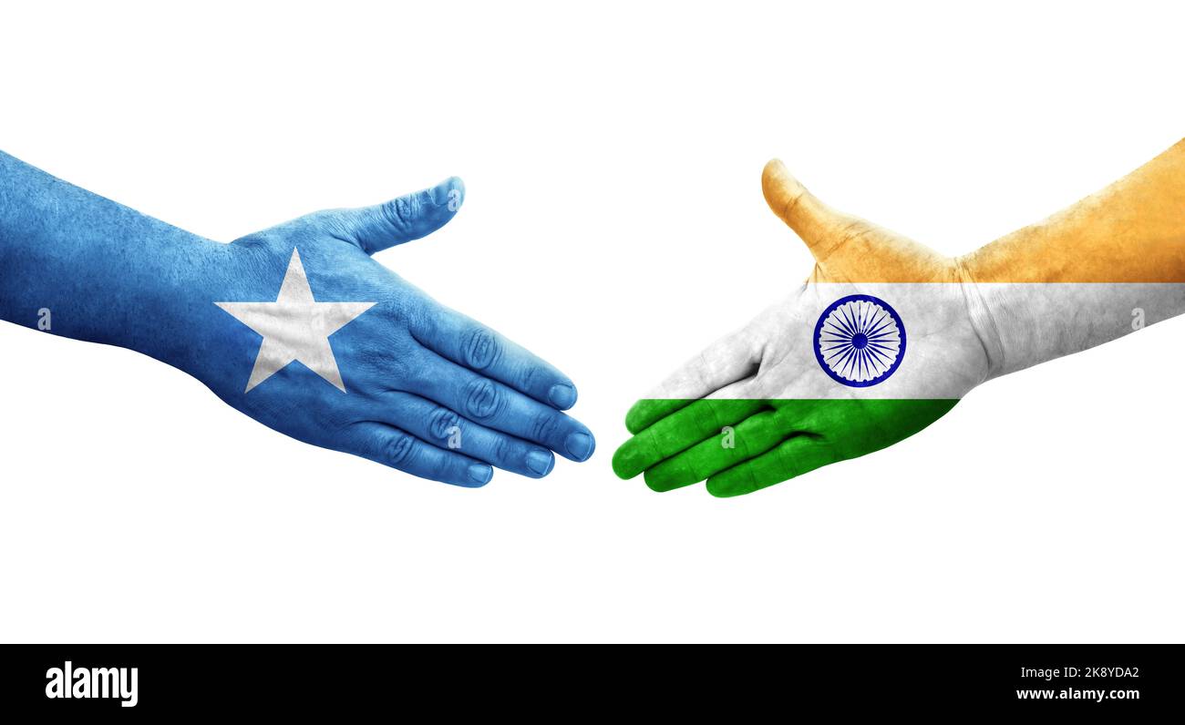 Handshake between India and Somalia flags painted on hands, isolated ...