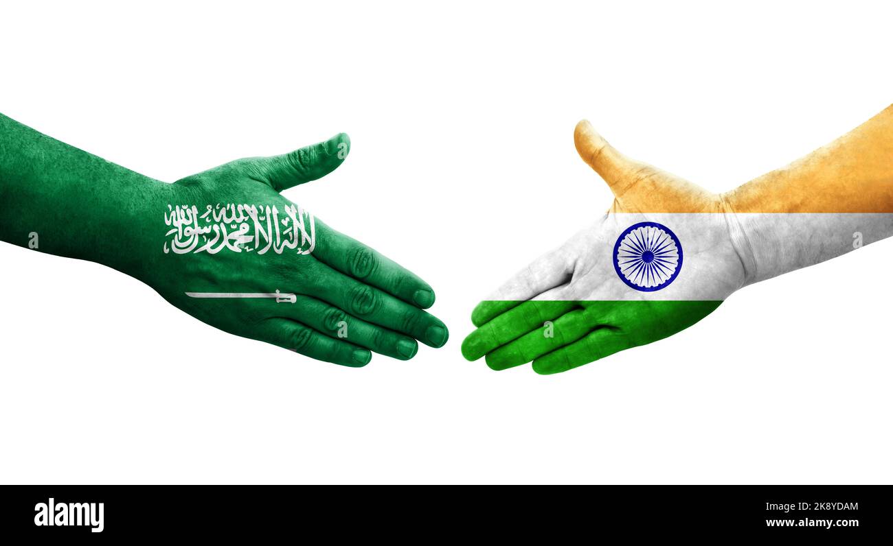 Handshake between India and Saudi Arabia flags painted on hands ...