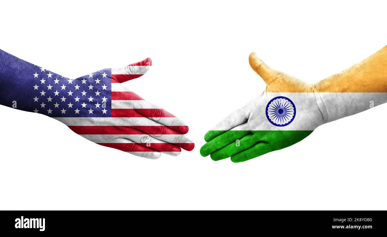Handshake between India and USA flags painted on hands, isolated ...