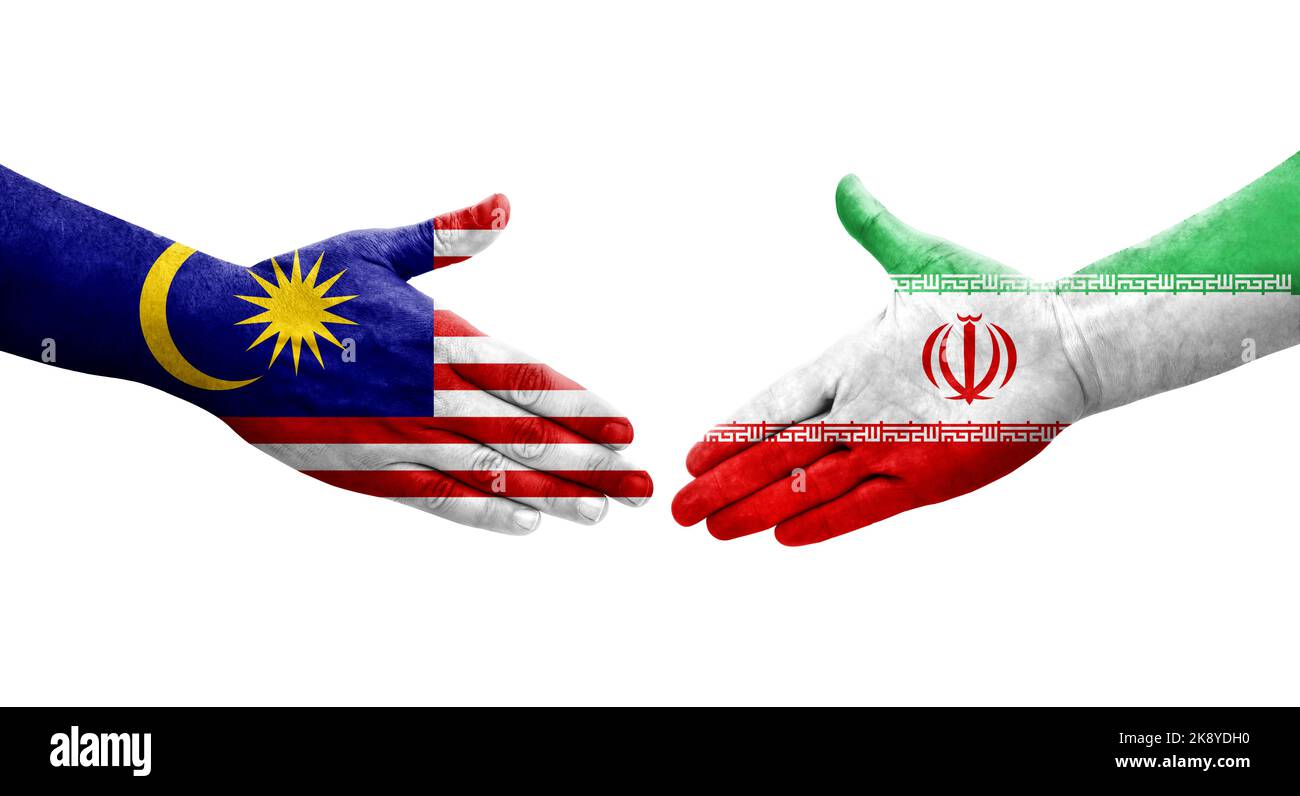Handshake between Iran and Malaysia flags painted on hands, isolated ...
