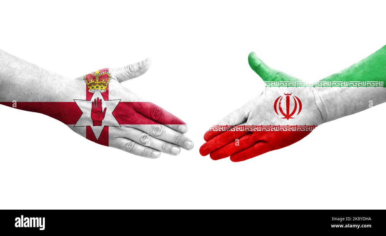 Handshake between Iran and Northern Ireland flags painted on hands ...
